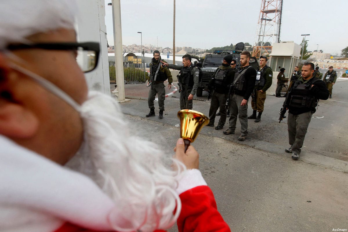 Israeli forces suppress Bethlehem’s ‘Santa Claus march’ with tear gas ...