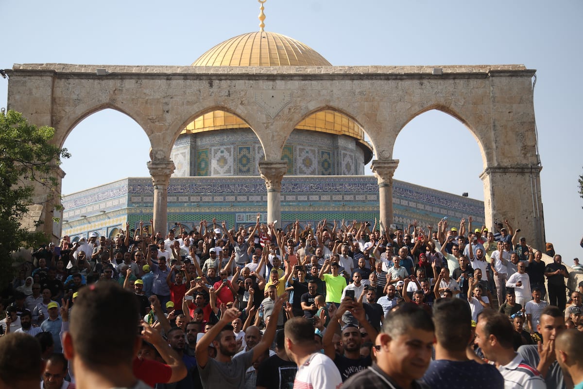 JERUSALEM – JULY 27 : Palestinians celebrate following the removal of ...