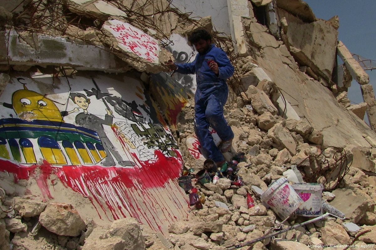 Syrian graffiti artist: Turning damaged buildings into art – Middle ...