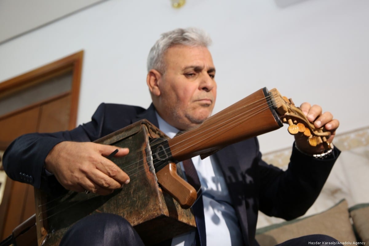Iraq teacher turns Kalashnikov into music – Middle East Monitor