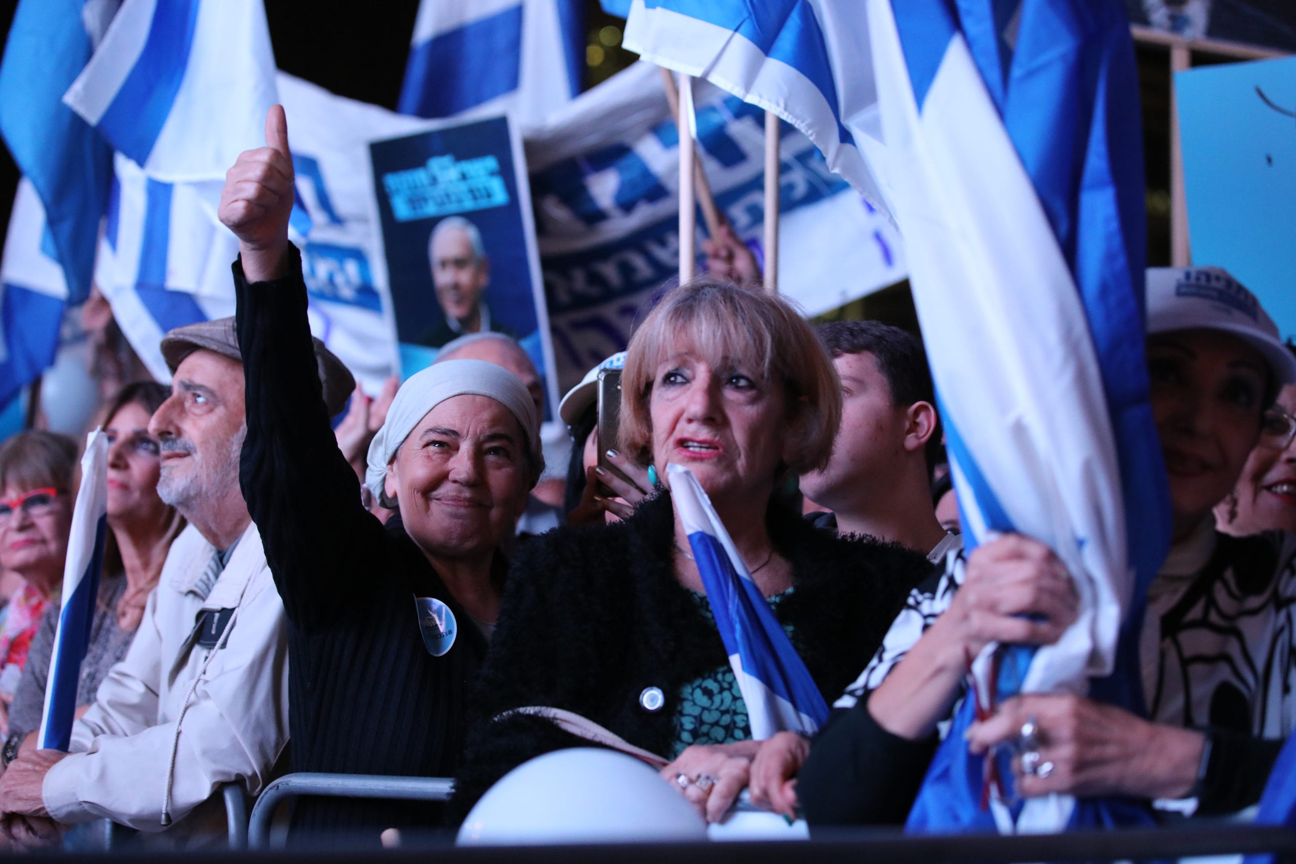 Thousands rally in support of Israel’s Netanyahu after graft indictment ...