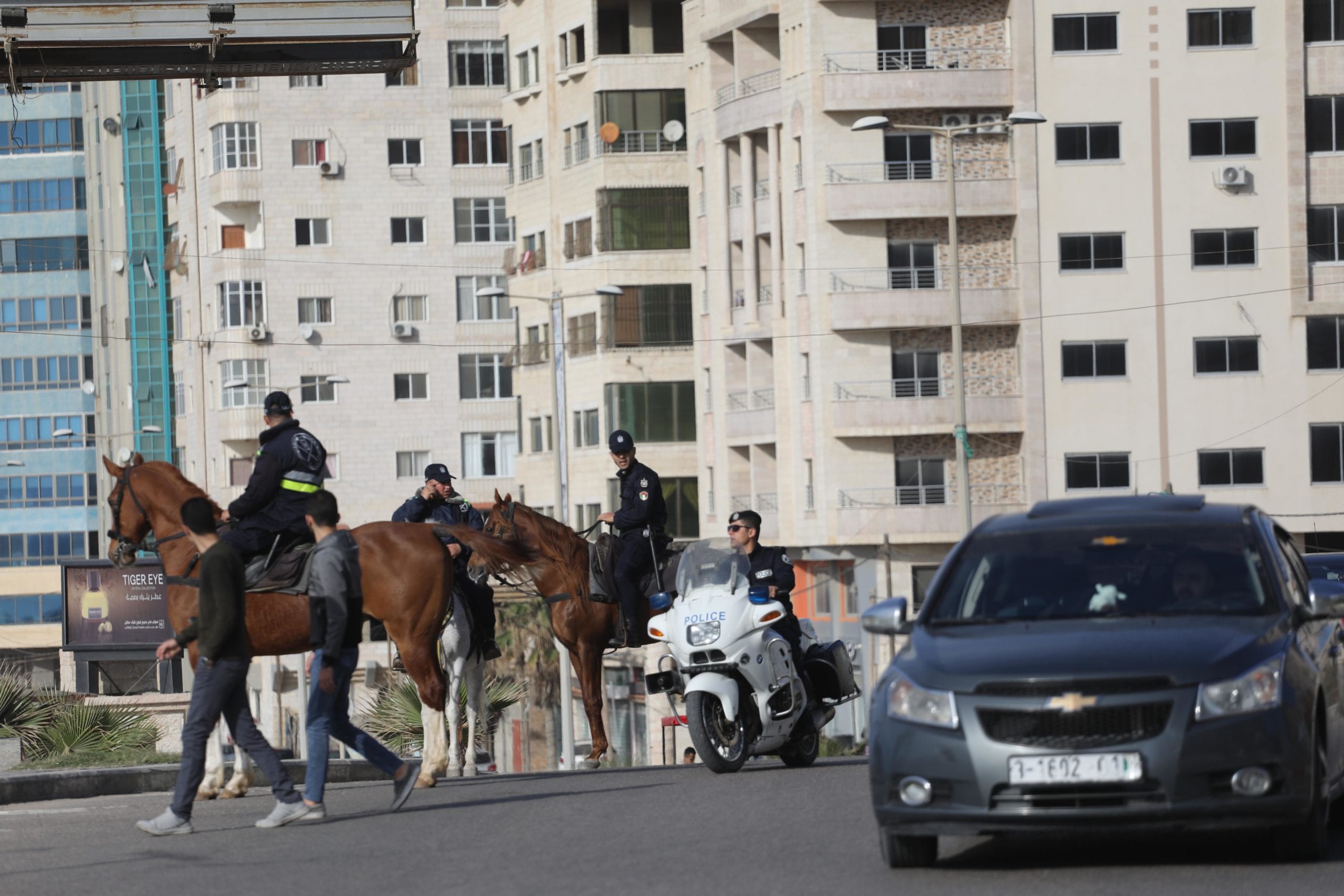 Gaza police stop cars parking along the beach to reduce public ...