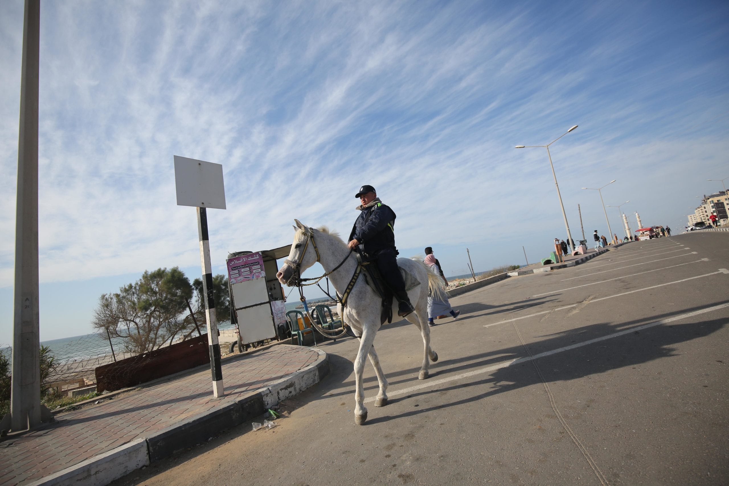 Gaza police stop cars parking along the beach to reduce public ...