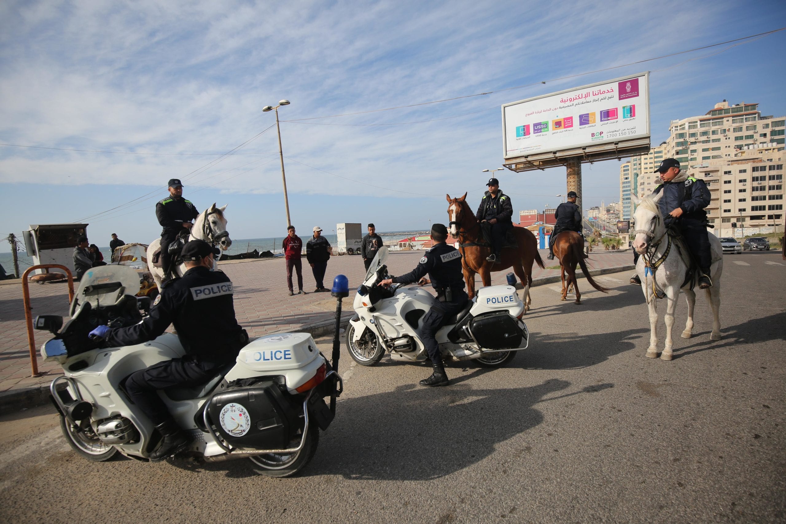 Gaza police stop cars parking along the beach to reduce public ...