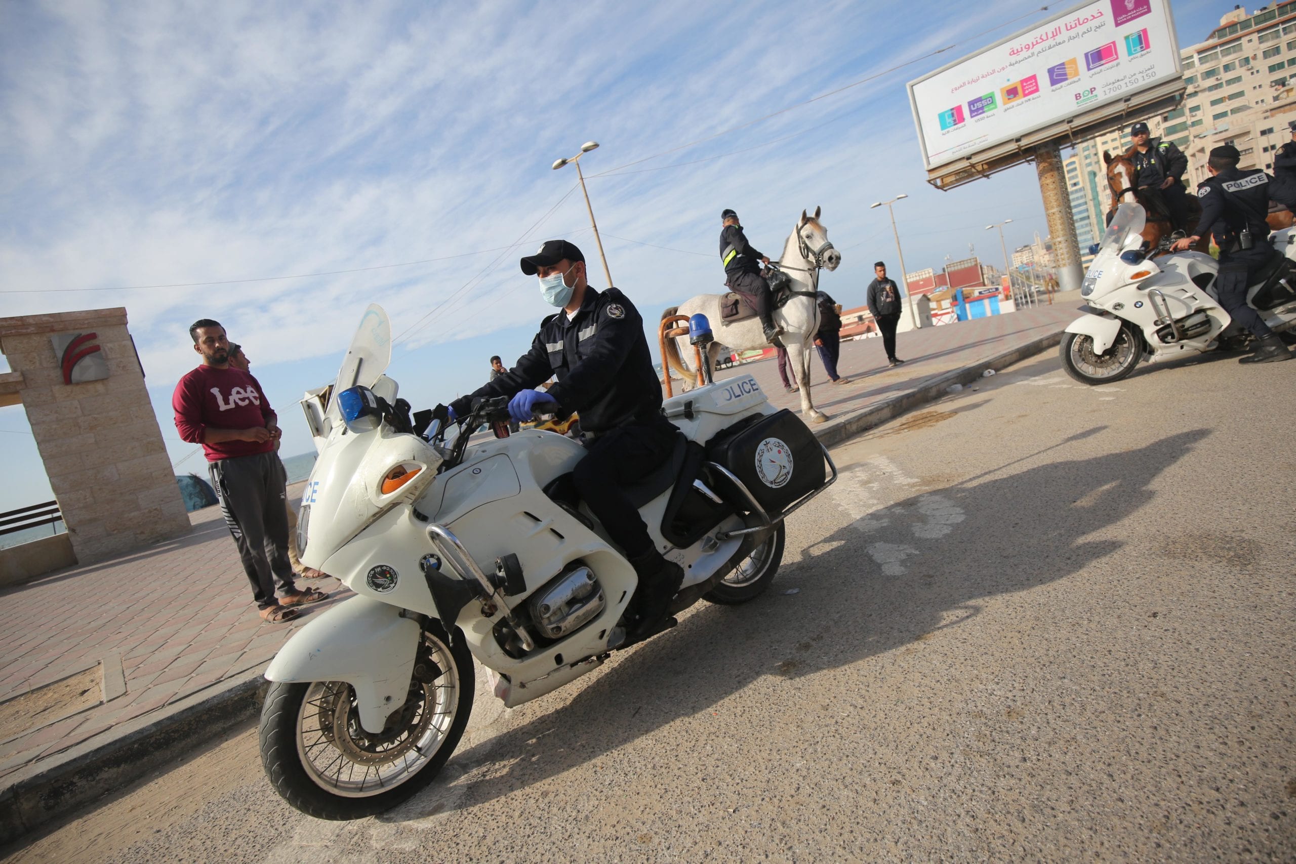 Gaza police stop cars parking along the beach to reduce public ...