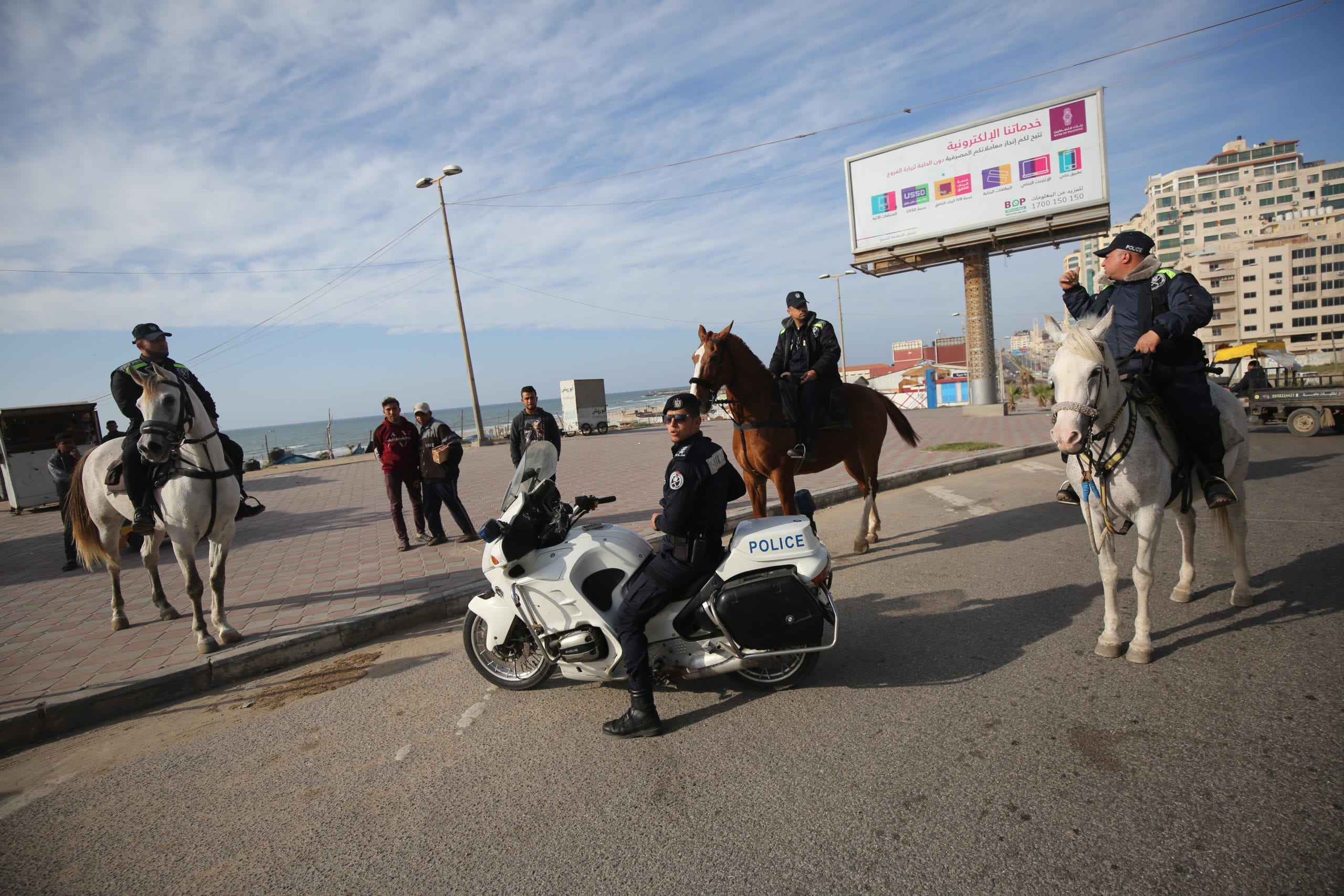 Gaza police stop cars parking along the beach to reduce public ...