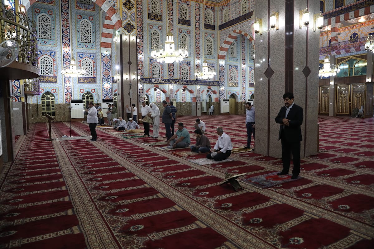 ERBIL, IRAQ – MAY 11: Muslims perform Tarawih prayer during the Islamic ...