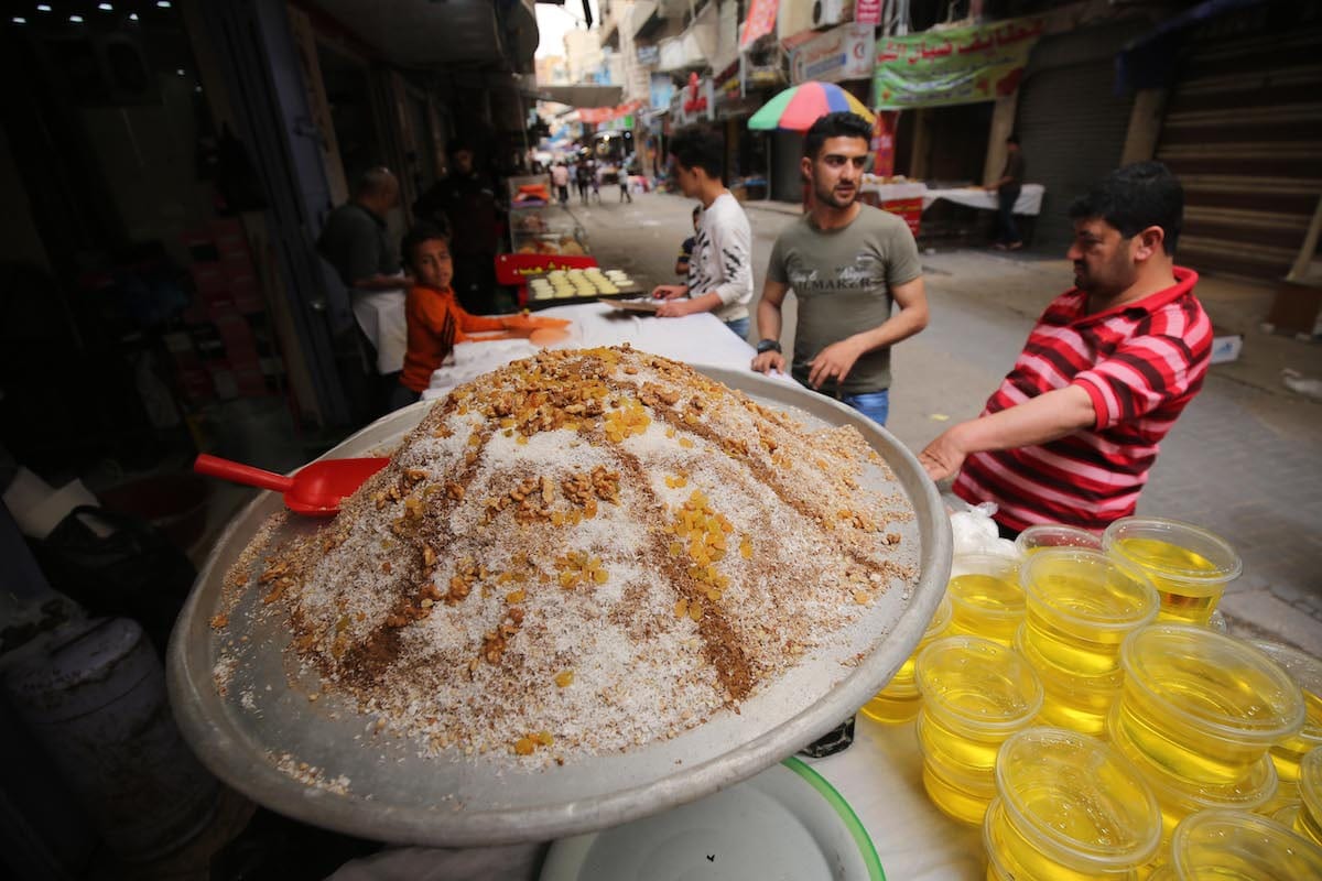 Palestinians make multi-coloured atayef during Ramadan – Middle East ...