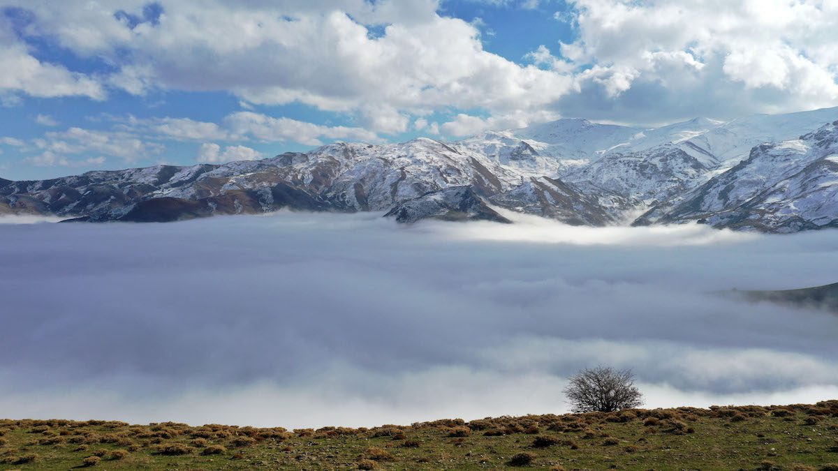 MUS, TURKEY – NOVEMBER 24: Snow and mist cover mountains around ...