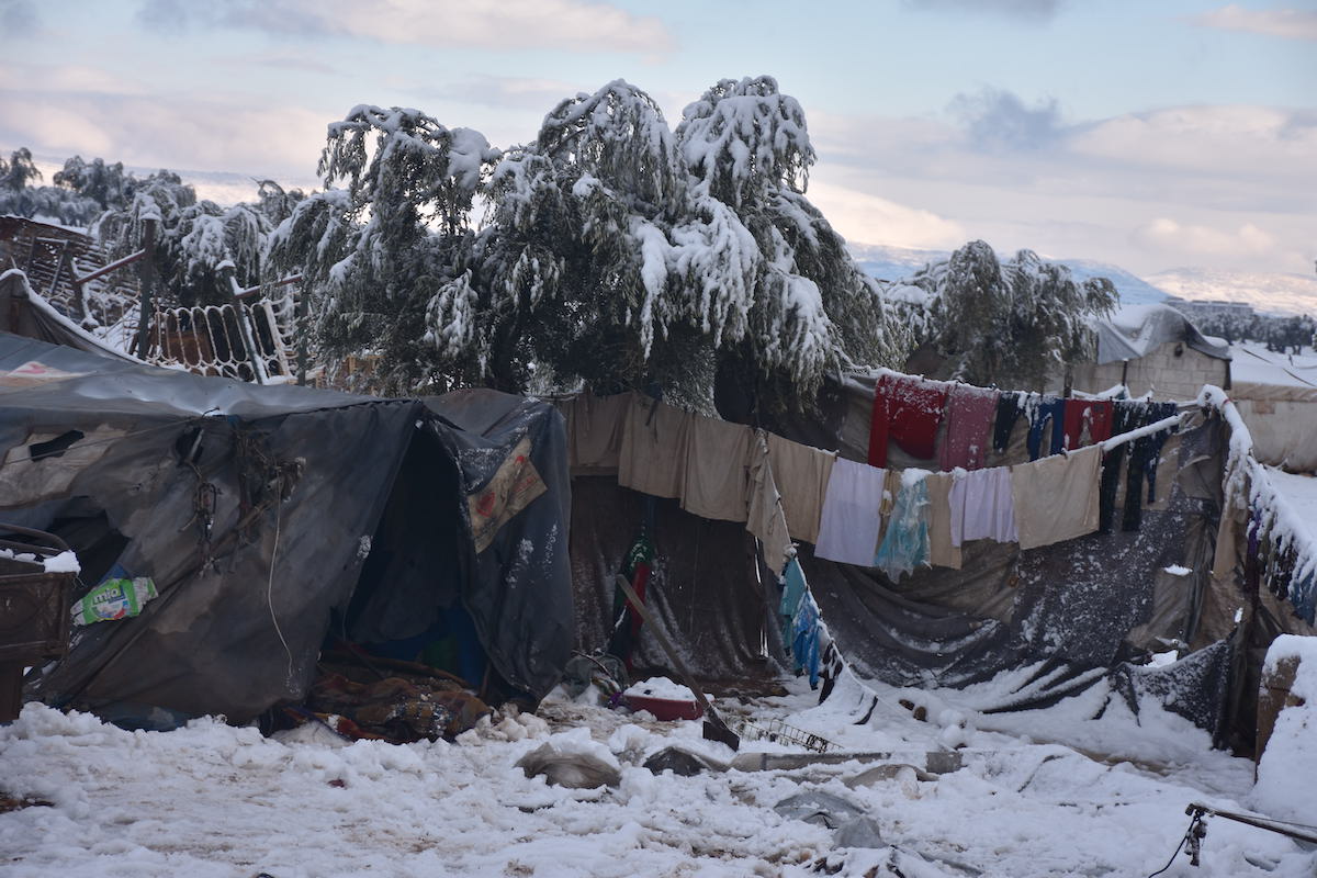 Snowfall brings down tents in northern Syria, leaving refugees out in ...