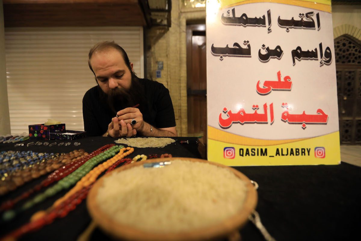 Iraqi calligraphy artist turns rice grains into works of art – Middle ...