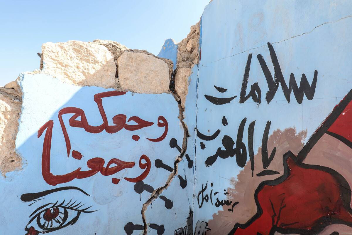 Syrian graffiti artist Aziz Esmer shows solidarity with Moroccans ...