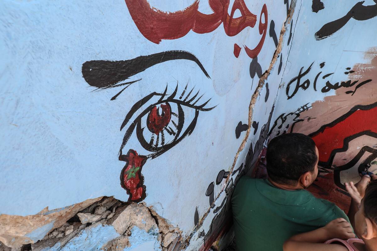 Syrian graffiti artist Aziz Esmer shows solidarity with Moroccans ...