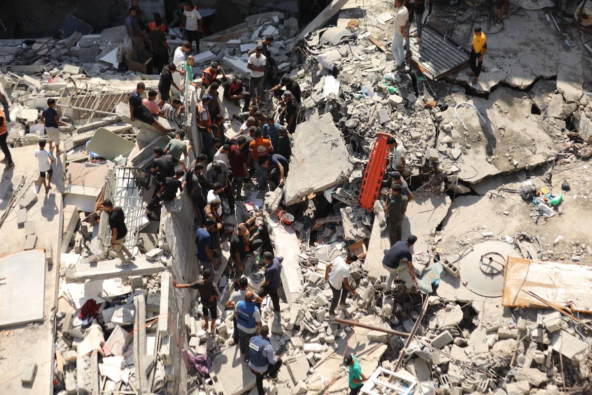 Five-story building in Israeli attacks collapses on residents in Gaza ...