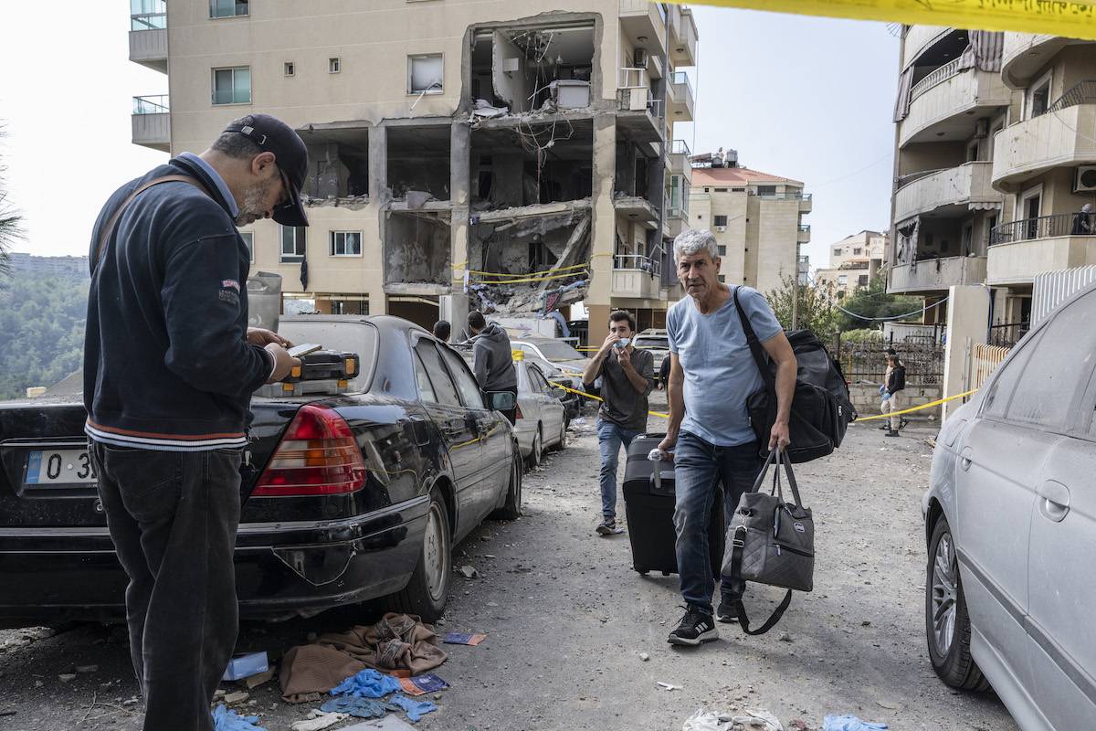 Residents flee with belongings as Israeli army attacks Beirut’s Doha ...
