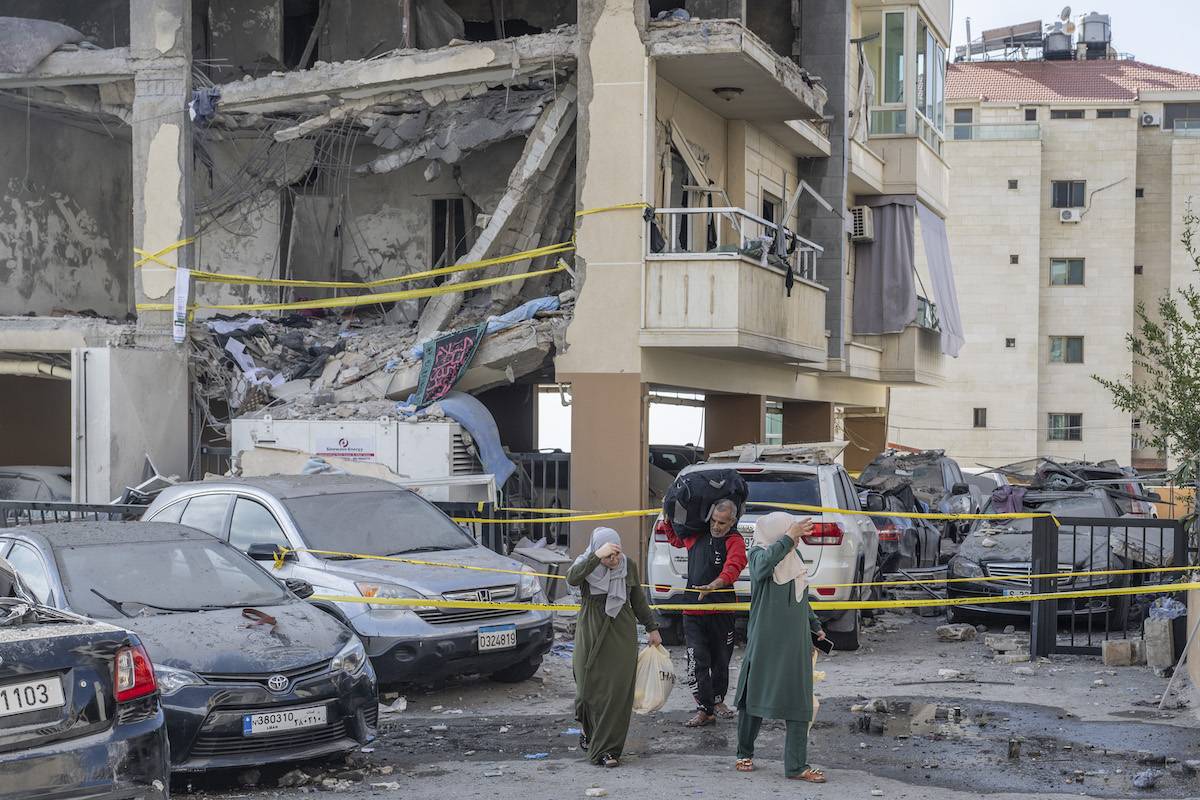 Residents flee with belongings as Israeli army attacks Beirut’s Doha ...