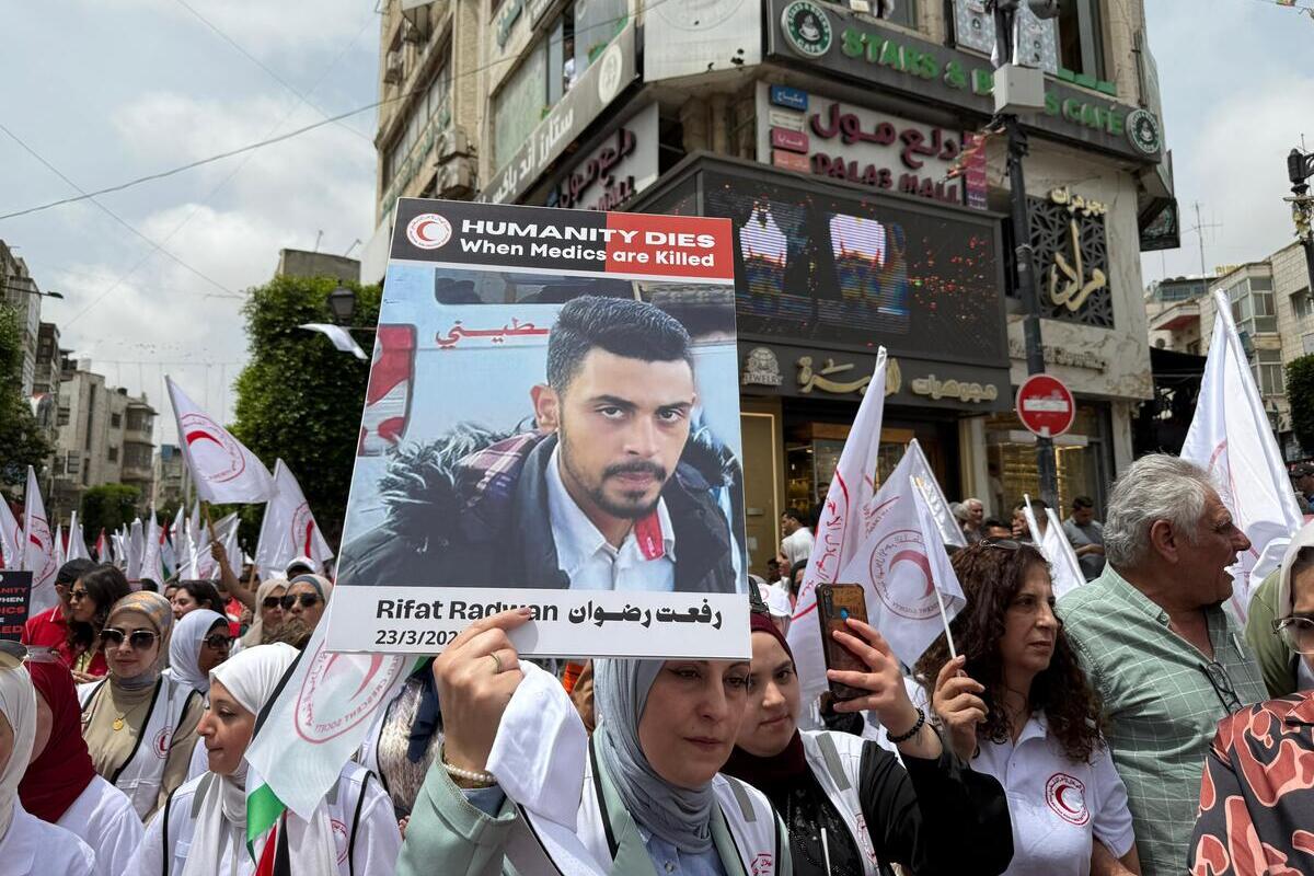 Palestinian paramedics hold silent funeral march on Red Cross and Red ...