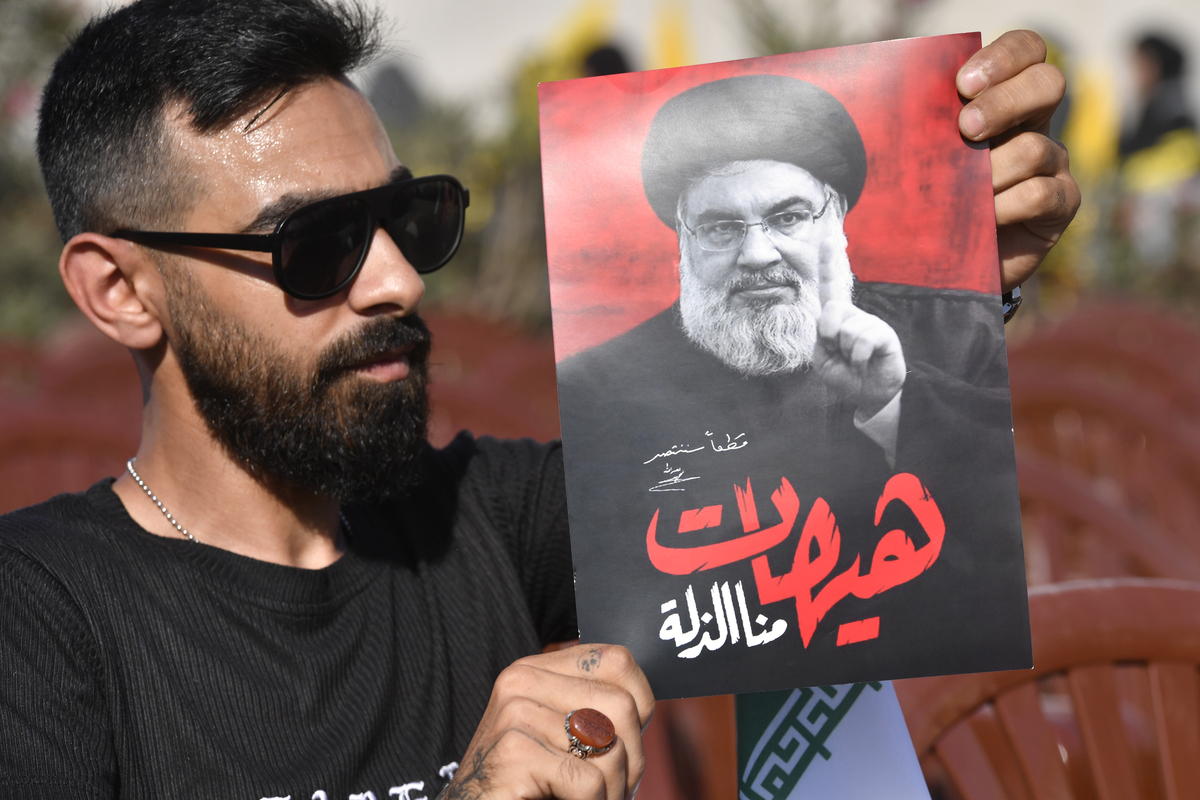 Hezbollah supporters demonstrate solidarity with Iran in Beirut ...