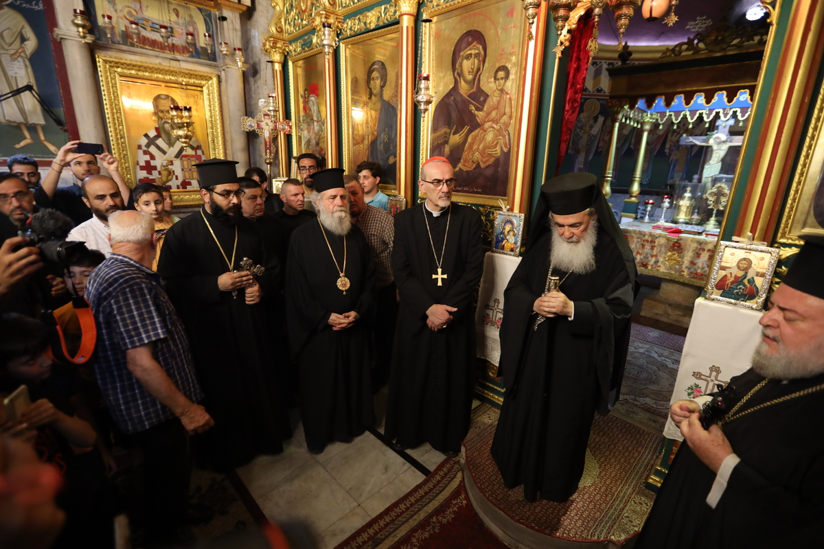 Religious leaders of the Catholic and Greek Orthodox churches in ...