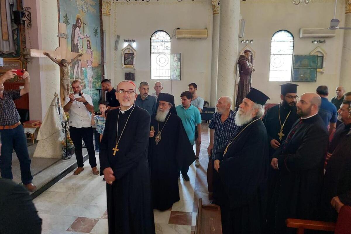 Religious leaders of the Catholic and Greek Orthodox churches in ...