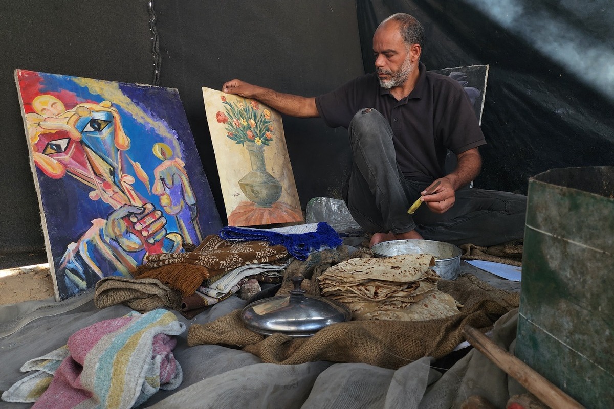 Palestinian artist Taha Abu Ghali destroys his paintings to feed his ...