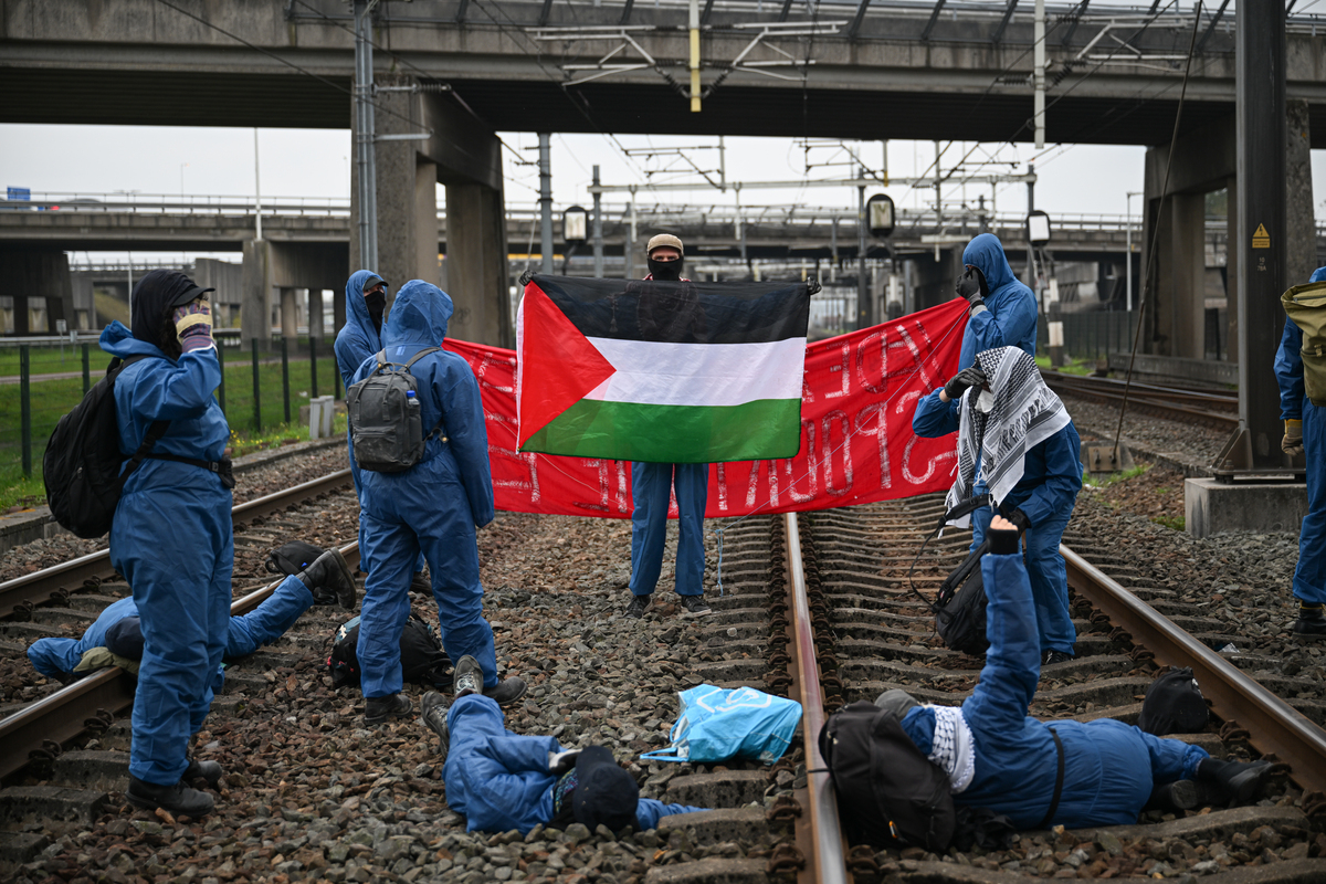 Activists block rails in Rotterdam port to protest NATO, Israeli ...