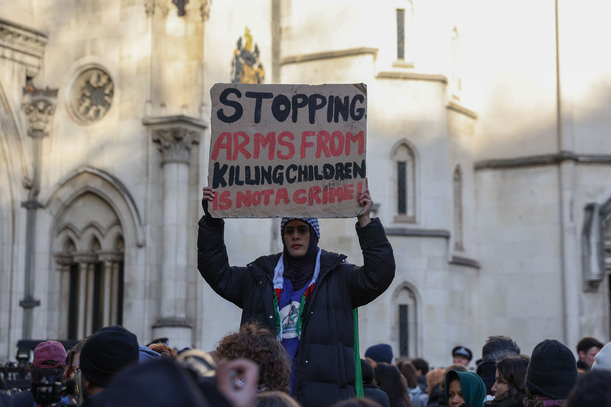 Police detain activists during the ‘Lift the Ban’ protest in London ...