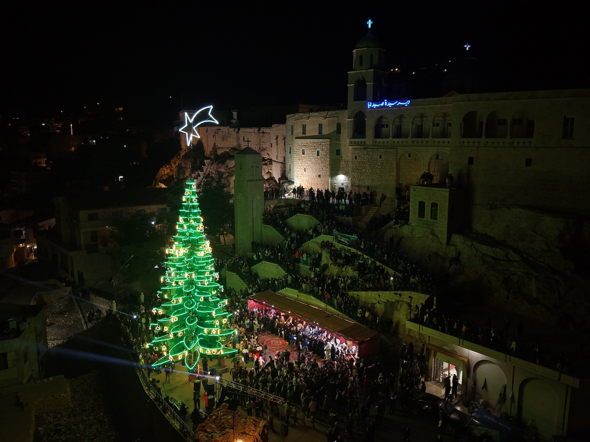 Christmas tree illuminated at the Saydnaya Our Lady Monastery in Syria ...